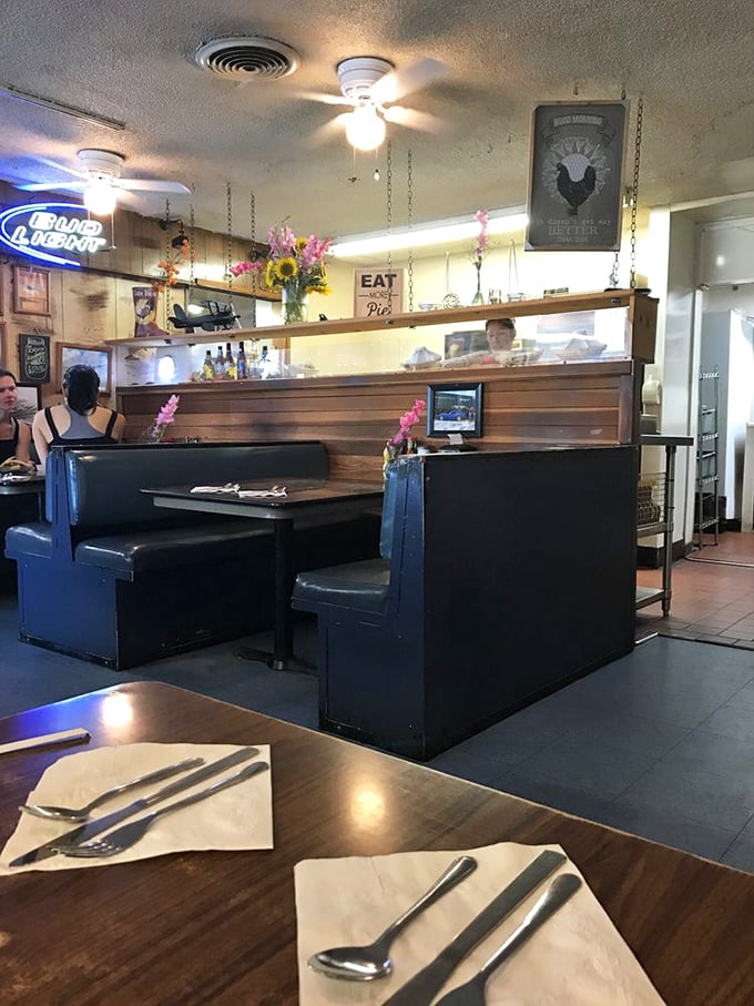 Classic diner booths where countless road trip stories have been shared over plates of food that make the journey worthwhile.