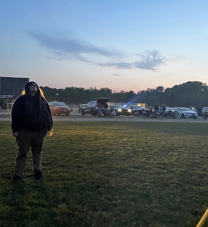 That magical moment when day surrenders to night, and the drive-in transforms from parking lot to outdoor cinema.