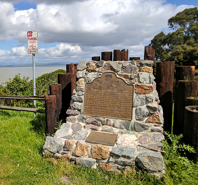 Historical markers throughout the park tell the story of resilience and cultural heritage that shaped this unique coastal community.