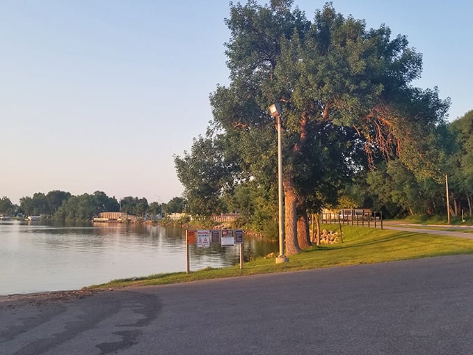 Ehlers Park offers that quintessential Minnesota scene: tranquil waters, towering trees, and the promise of sunset views worth savoring.