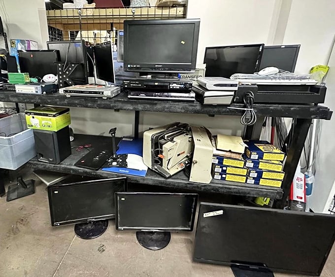 The electronics section: where yesterday's technology awaits tomorrow's tinkerers, each screen a potential project for the digitally adventurous.