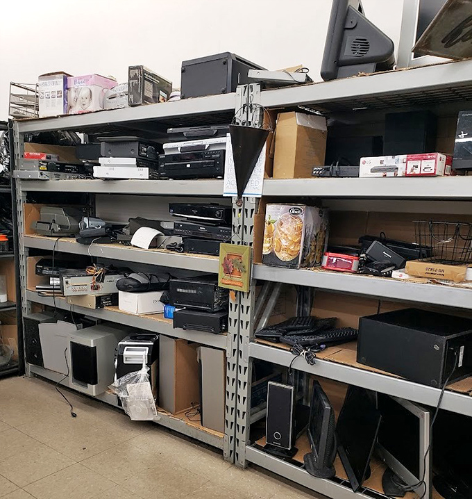 Electronics from various decades coexist peacefully, proving that sometimes the old ways still work just fine.