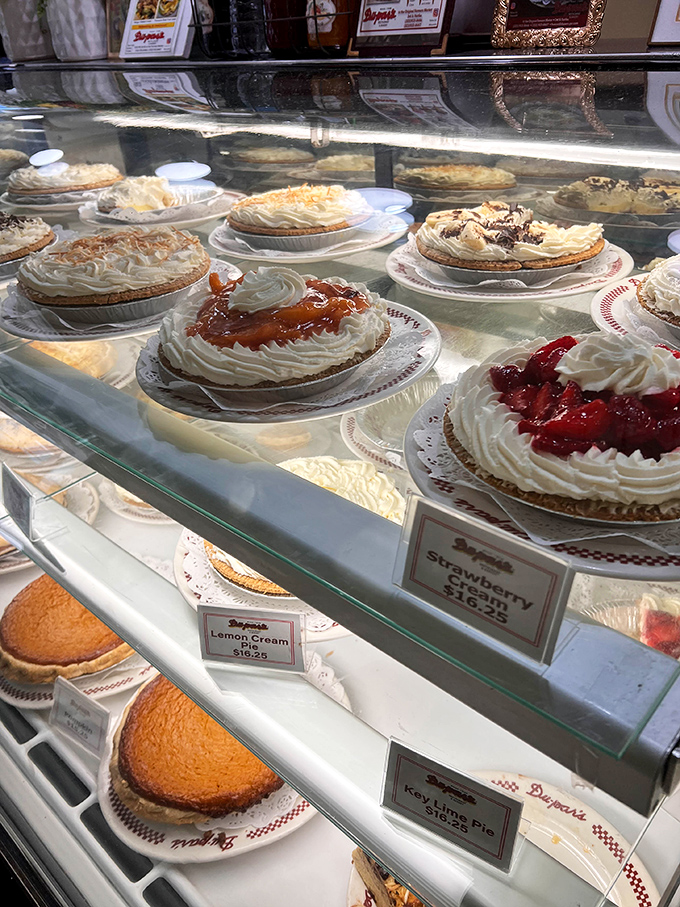 A display case of pies that makes you realize pie is less of a dessert and more of a legitimate life philosophy.