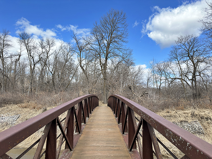 This footbridge doesn't just connect two shores&mdash;it bridges present day with the past. History's pathway, one plank at a time.