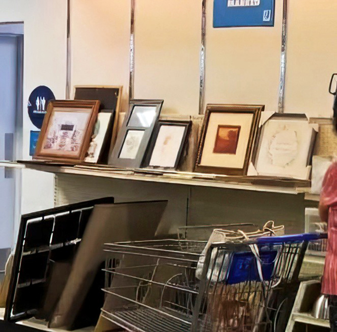 Picture frames holding memories of strangers, ready to frame your own. That ornate wooden one would make even a grocery list look like a historical document.