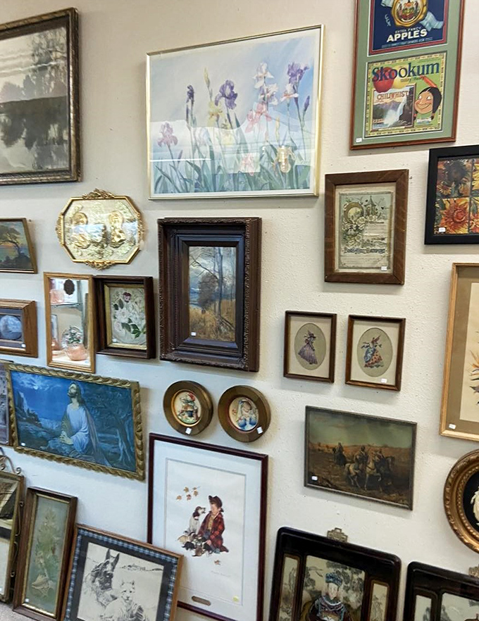 Wall art that transforms blank spaces into conversation starters. This gallery wall approach shows how mixing eras creates unexpected visual harmony.