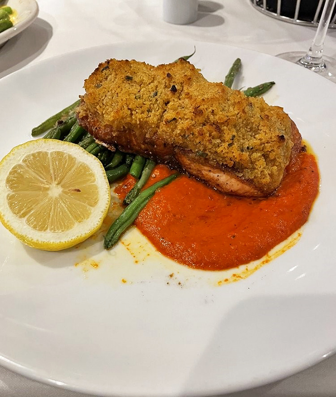 Garlic lemon crusted salmon brings bright, fresh flavors that make you feel healthy even while you're planning what dessert to order next.