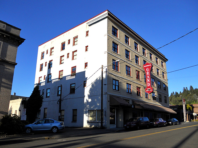 The Grand Hotel's vintage sign beckons travelers as it has for generations, a landmark in Roseburg's evolving downtown story.