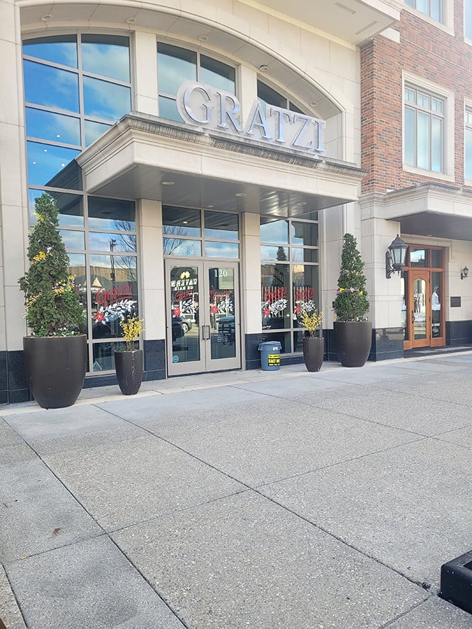 Gratzi's elegant entrance promises an Italian dining experience where the only thing more polished than the stone facade is the service waiting inside.