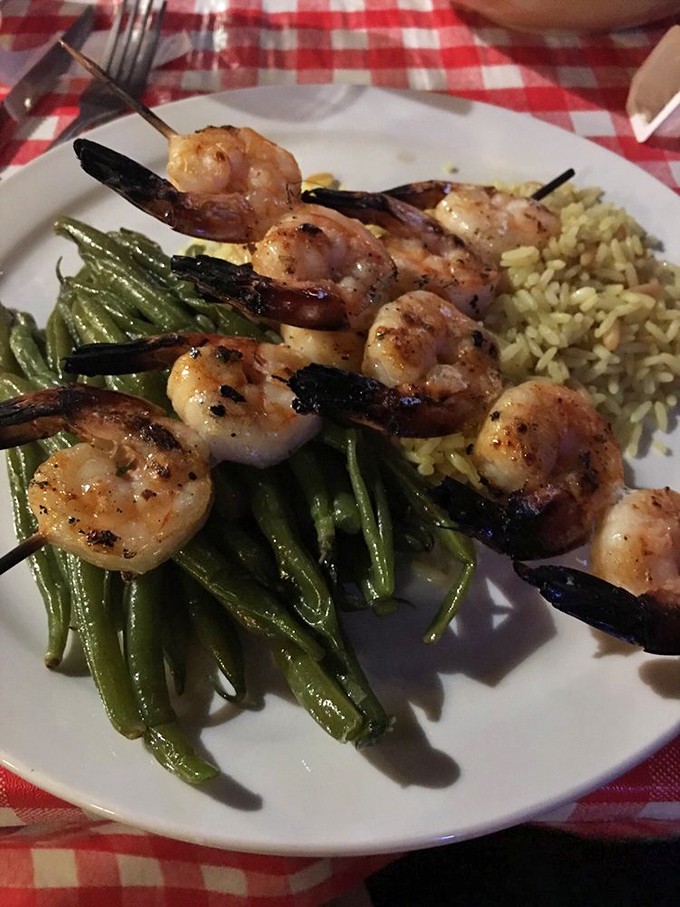 Grilled shrimp skewers playing nicely with green beans and rice – proof that Pinnacle Peak knows there's more to life than just beef.