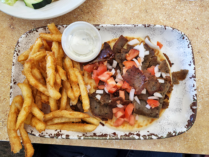This gyro plate doesn't just cross borders &ndash; it demolishes them, bringing Mediterranean flair to the Hoosier heartland with every savory bite.