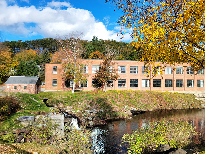 Autumn transforms this historic mill into a watercolor painting come to life. The brick building isn't just preserved &ndash; it's still telling stories through every reflected ripple.