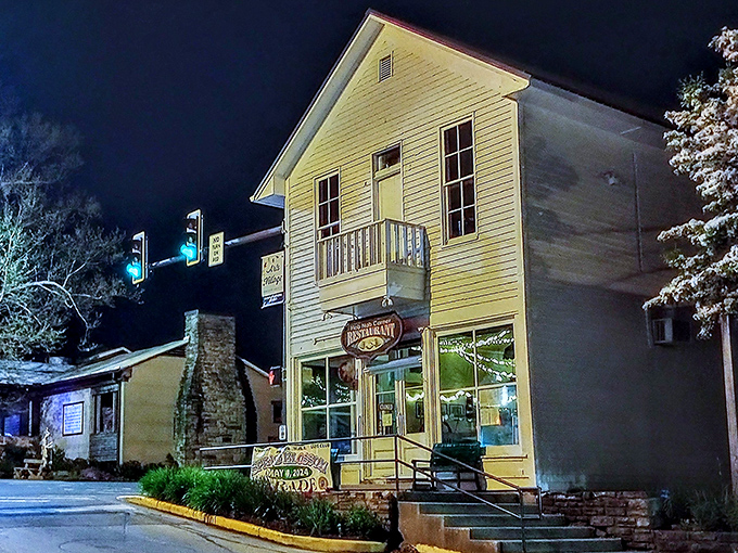 The Hobnob Corner Restaurant glows with invitation after dark. Those windows promise comfort food that makes chain restaurants seem like distant, forgettable relatives.