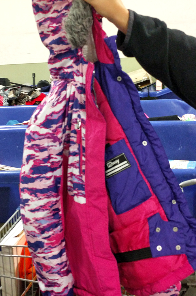 Vintage winter wear with personality to spare. That purple and pink combo screams "I survived the 90s and kept my fashion sense intact."
