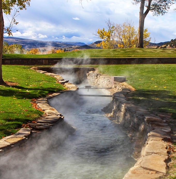 Steam rising like nature's own spa treatment. This hot spring channel is what your stressed muscles have been dreaming about all year.