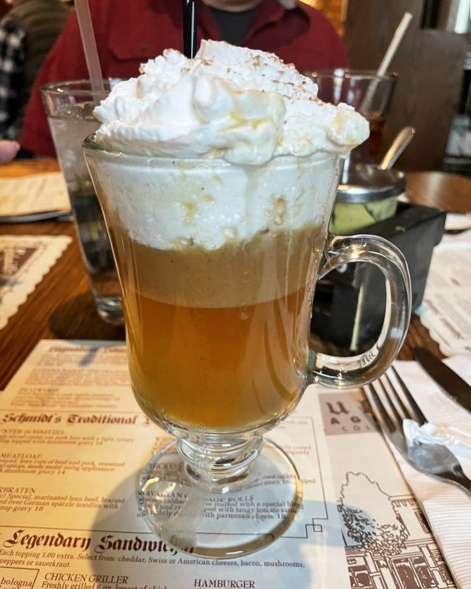This isn't just hot butter rum&mdash;it's a warm hug in a glass, topped with enough whipped cream to make your mustache jealous. 