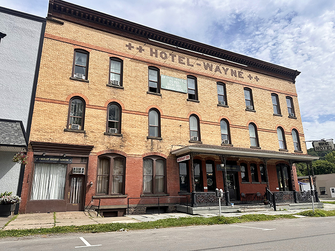 Hotel Wayne stands as a brick testament to bygone travel days, when hotels were landmarks rather than cookie-cutter boxes alongside highways.