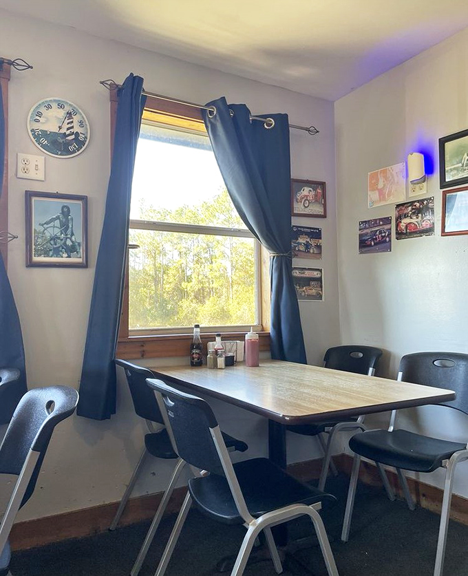 A cozy corner table where nautical meets rural Florida. The view outside reminds you you're miles from the ocean, making the seafood even more miraculous.