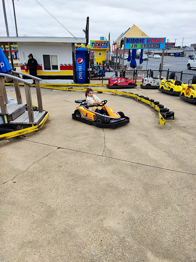 Not everything at the outlets is about shopping. Junior racers test their skills at Kiddie Karts, providing entertainment between retail adventures.