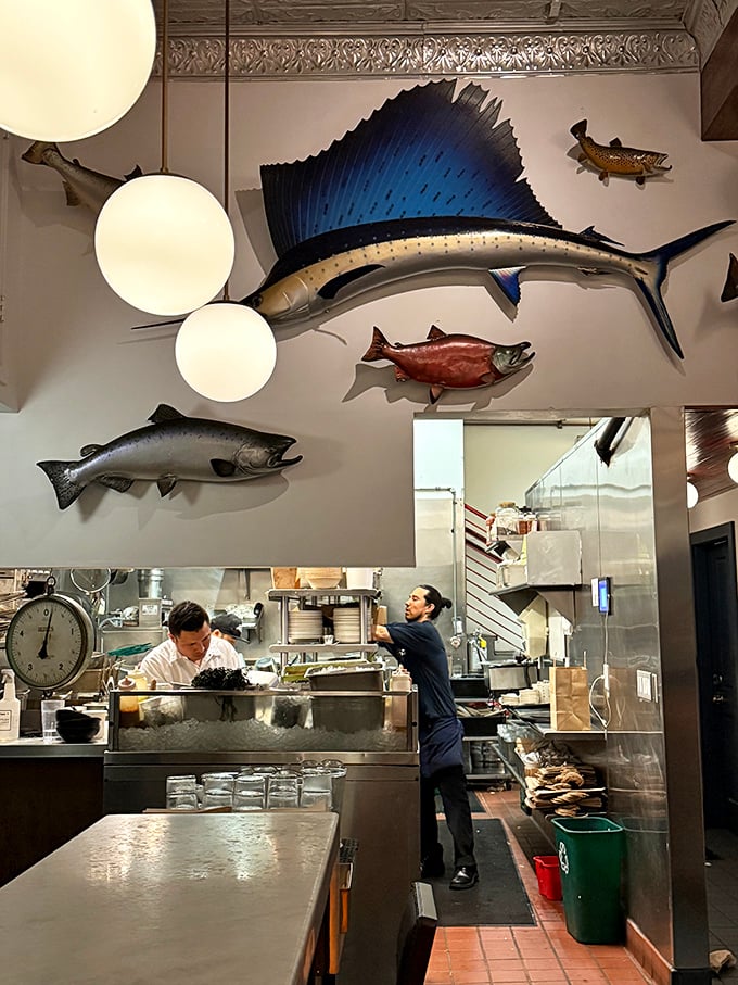 Behind the scenes, where seafood dreams come true&mdash;mounted fish keep watchful eyes on chefs transforming ocean treasures into memorable meals.
