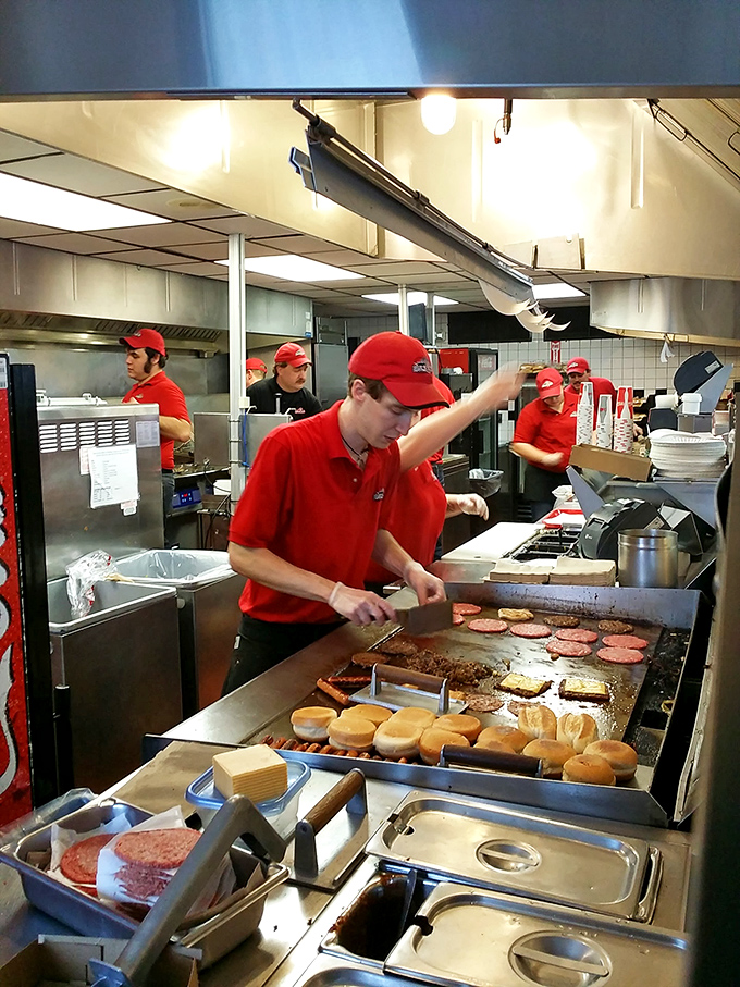 The kitchen ballet&mdash;where cooks in red caps orchestrate the sizzle and flip of Vermont's favorite comfort foods with the precision of seasoned performers.