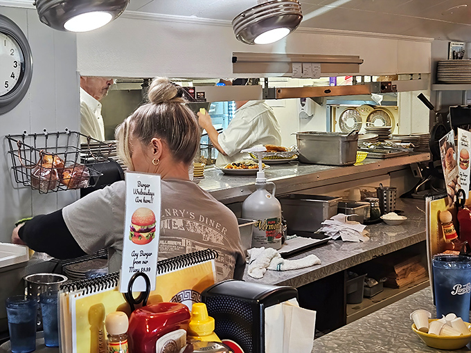 Behind the scenes where breakfast magic happens. Those cooks move with the choreographed precision of culinary ninjas.