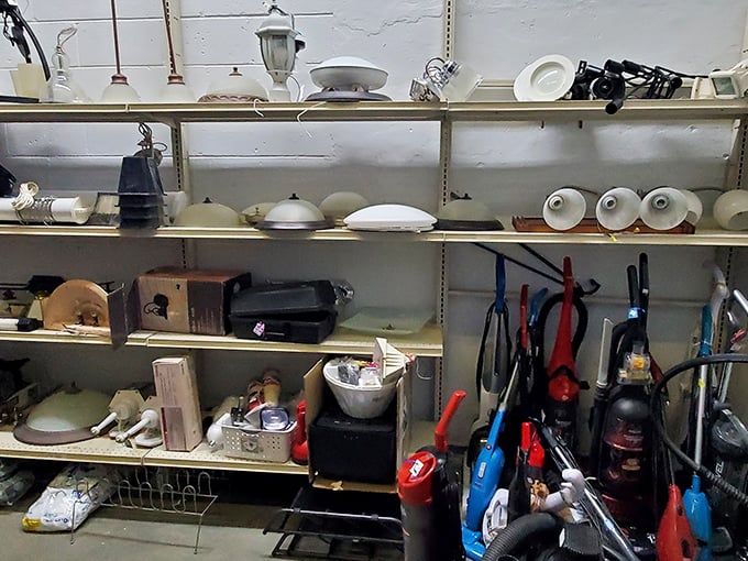 The lighting section: a graveyard of fixtures from decades past, where that perfect mid-century lamp base awaits its new shade.