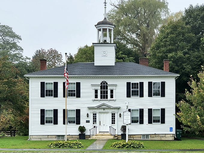 Lenox Academy's symmetrical perfection and cupola crown represent educational aspirations from another era. A building that teaches history simply by existing.