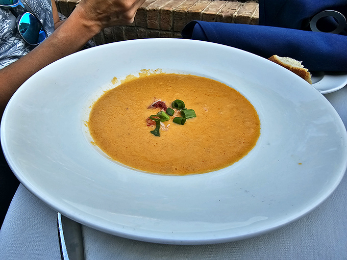 Lobster bisque so rich and creamy, it's basically the ocean's answer to a warm, comforting hug in a bowl.