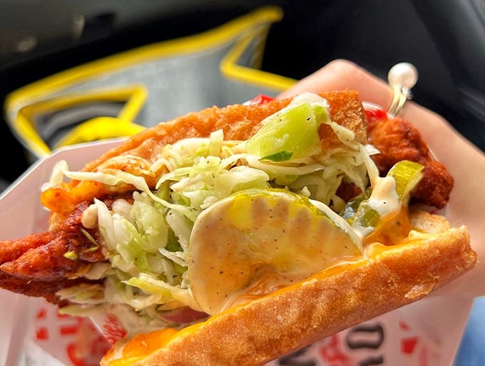 A sandwich so photogenic it should have its own agent. The perfect balance of crispy, creamy, tangy, and spicy in every carefully constructed bite.