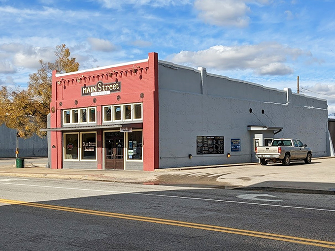 Main Street Barbecue's vibrant red facade promises comfort food that satisfies the soul without emptying the wallet.
