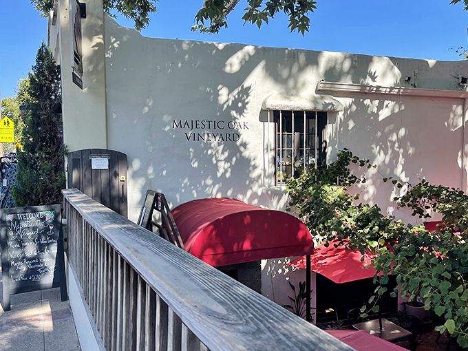 Majestic Oak Vineyard's entrance hints at the liquid treasures within&mdash;a sip of Ojai sunshine captured in bottles beneath dancing oak-leaf shadows.