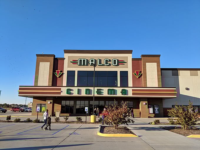 The Malco Cinema's retro marquee promises affordable escape into air-conditioned storytelling&mdash;where $10 still buys you two hours of Hollywood magic.