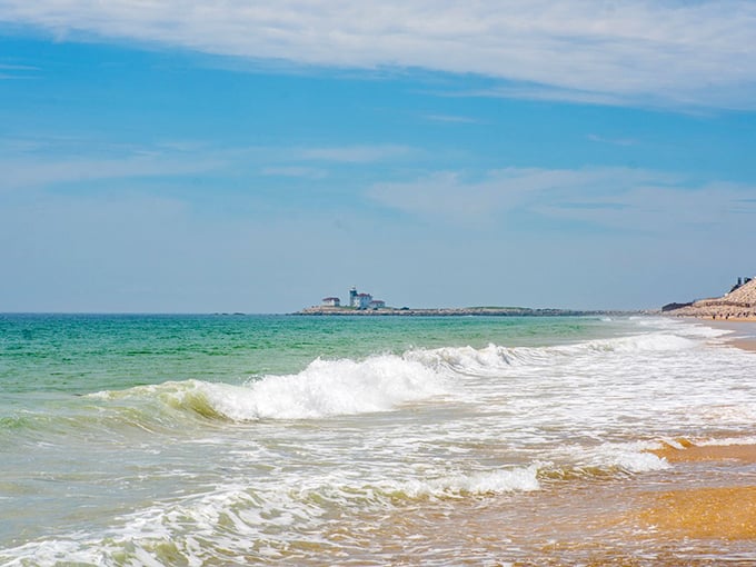 Misquamicut's golden sands catch the day's last light, transforming an ordinary beach stroll into what feels like walking through a painter's masterpiece.