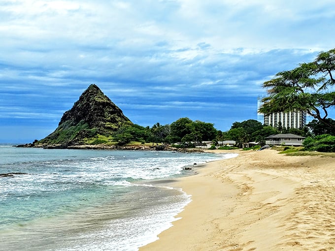 Mauna Lahilahi Beach Park's distinctive cone-shaped mountain stands guard over golden sands, like Hawaii's version of a miniature Matterhorn.