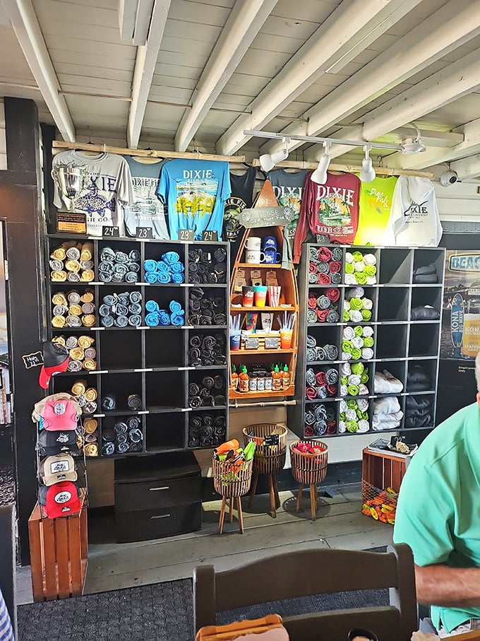 Dixie merchandise display that says "take a piece of the beach home"—because memories need souvenirs.