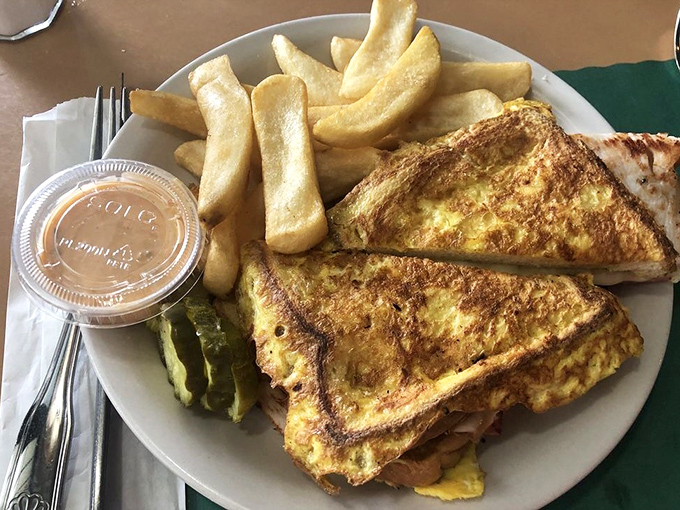 The Monte Cristo sandwich: where breakfast and lunch collide in a golden-fried treaty of deliciousness that demands a proper nap afterward.