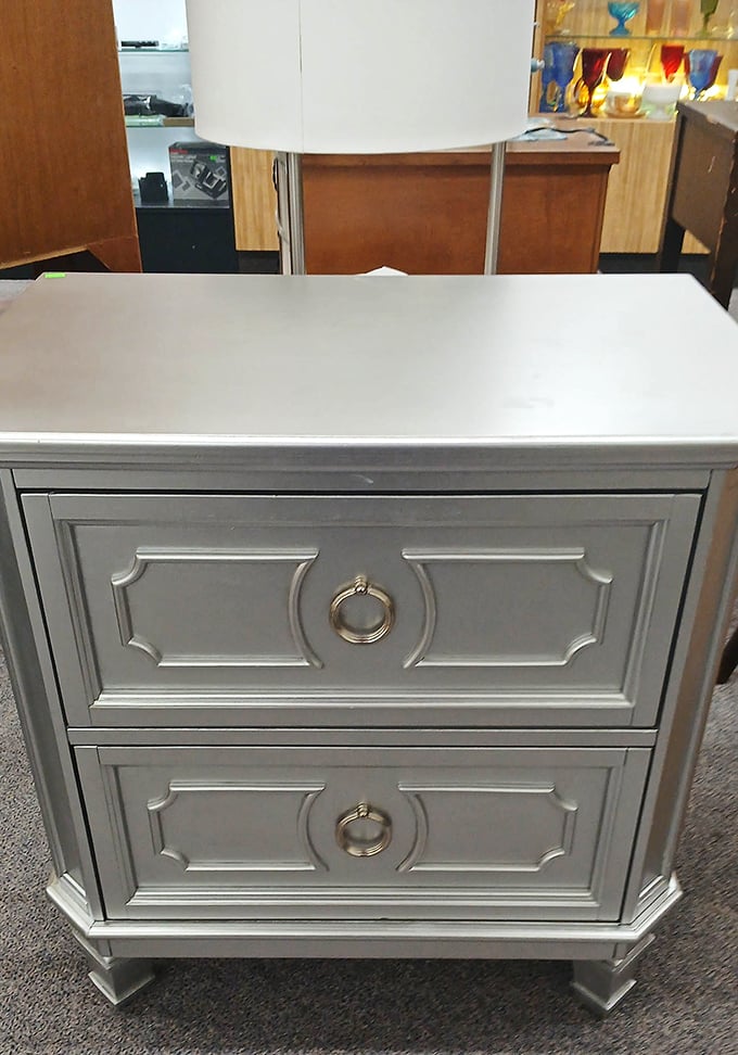 A freshly painted nightstand that someone lovingly restored, proving secondhand doesn't mean second-rate when you shop smart here.