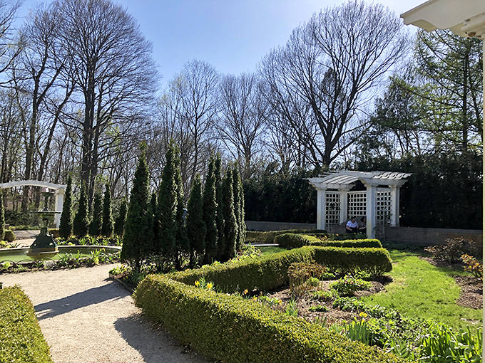 Winter reveals the garden's elegant bones, where even leafless trees and dormant beds maintain a dignified beauty that puts my winter wardrobe to shame.