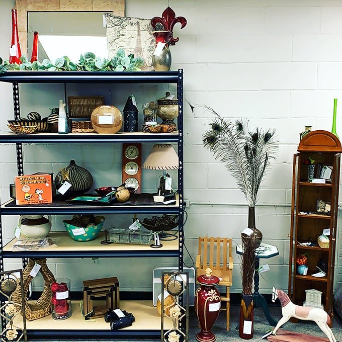Peacock feathers, vintage lamps, and a rocking horse&mdash;this display is what happens when your grandmother's attic gets a stylish makeover.