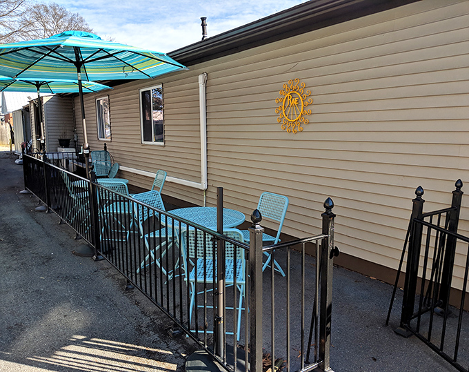 The outdoor seating area—where you can pretend you're people-watching on the Champs-Élysées while actually in Delaware.