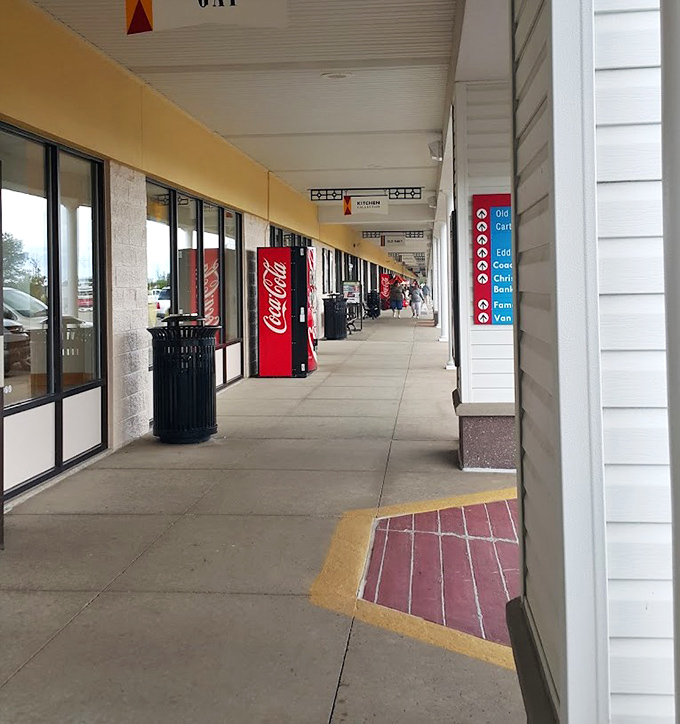 The mall's spacious walkways invite leisurely browsing, with convenient vending machines standing ready for mid-shopping caffeine emergencies.