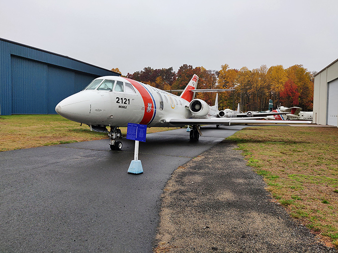 The Coast Guard's Falcon jet stands ready for duty even in retirement. Its red racing stripe adds a touch of panache to this high-flying lifesaver.