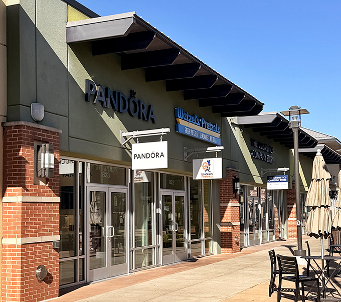 Pandora charms sparkle behind glass, offering customizable jewelry memories at prices that won't make your own charm bracelet weep.