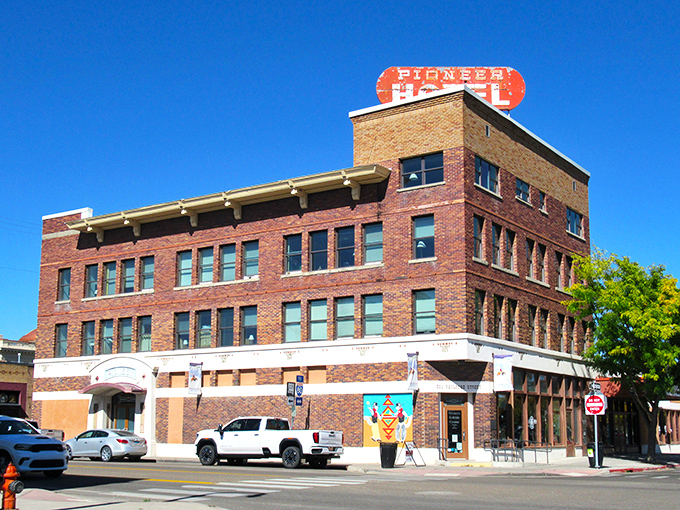 The brick-built Pioneer Hotel stands as a testament to Elko's enduring spirit, its weathered sign hinting at countless stories from Nevada's colorful past.