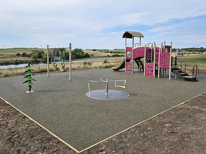 Kid-tested, parent-approved! This playground proves that even in a park full of natural wonders, sometimes children just want a good old slide.