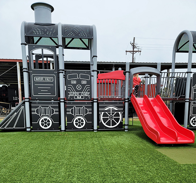 This locomotive-themed playground proves that train fascination starts young. Those slides probably generate more squeals of delight than any actual train whistle.