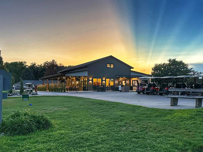 Sunset at the golf course transforms an ordinary evening into a postcard moment, with golf carts standing ready for tomorrow's friendly competitions.
