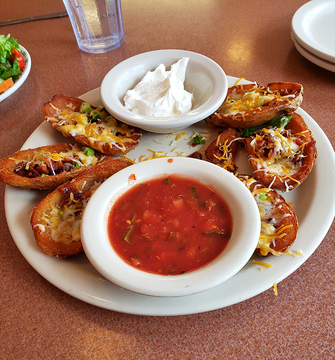 These loaded potato skins arrive like little boats of joy&mdash;cheese-laden vessels carrying flavor to previously unknown heights.