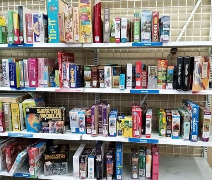 Puzzles and games stack high, offering entertainment that doesn't require wifi, charging cables, or monthly subscription fees whatsoever.